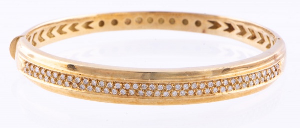 Pulseira escrava em ouro 18k com 74 brilhantes. Diam.: